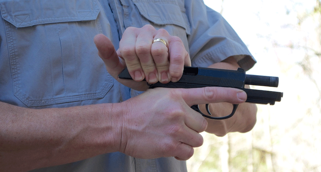 Simply can't rack slides - is using the slide stop okay? : guns