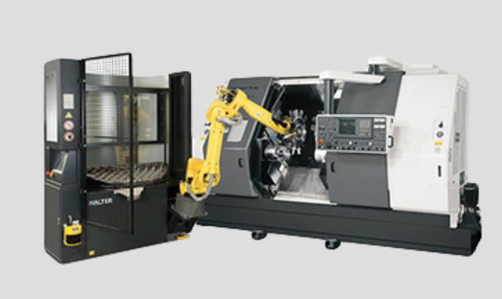Nakamura-Tome CNC machine automated with HALTER LoadAssistant